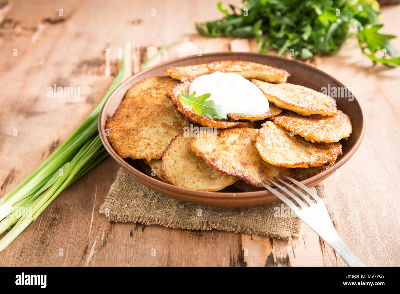 Draniki - potato fritters. potato pancakes. The naitonal dish of ...