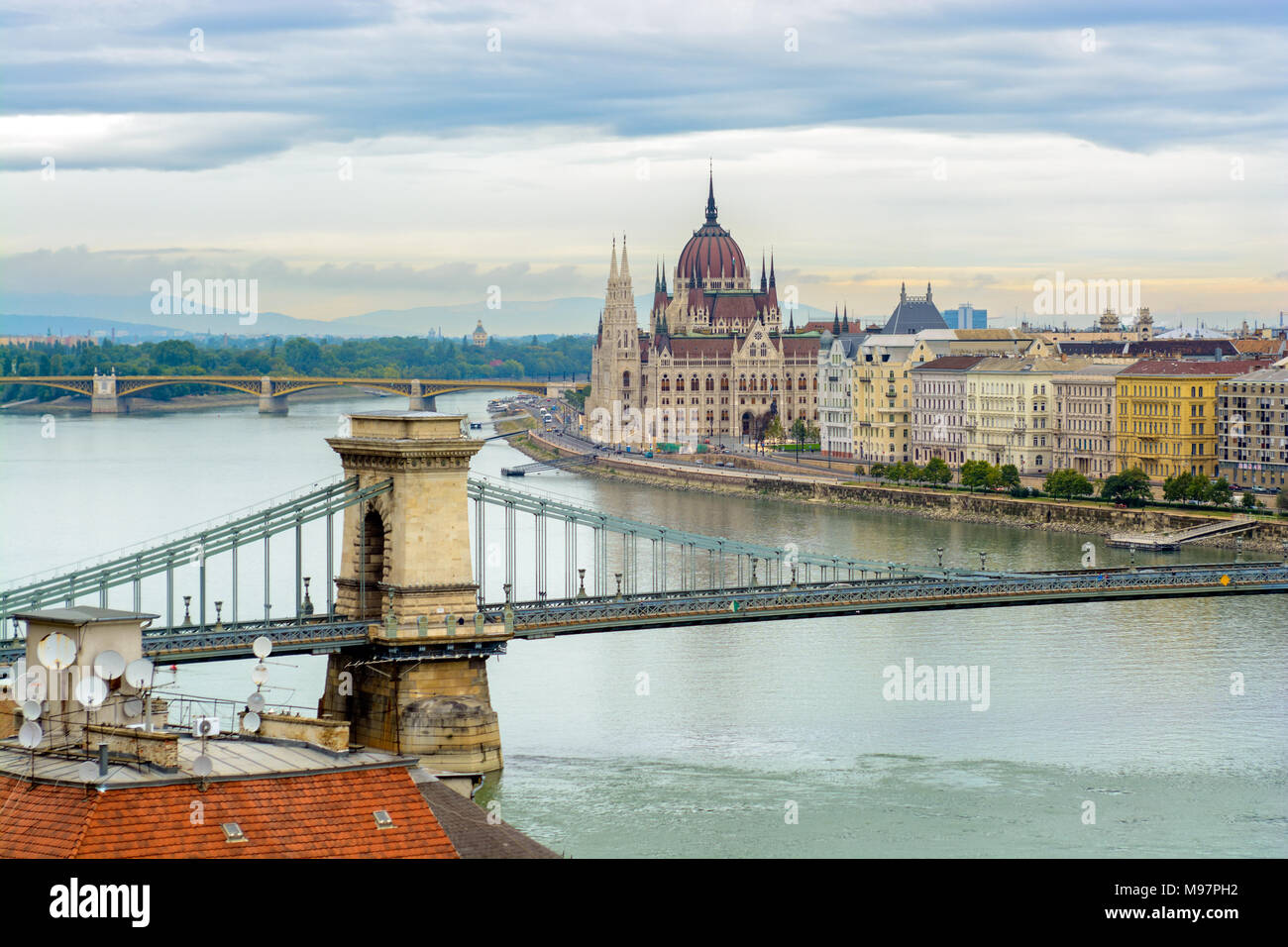 Chain bridge and Pest riverfront with Parliament building. Budapest ...