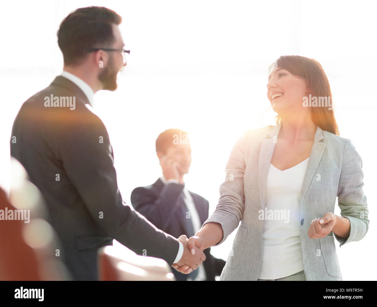 handshake between colleagues in the workplace .photo with copy space ...