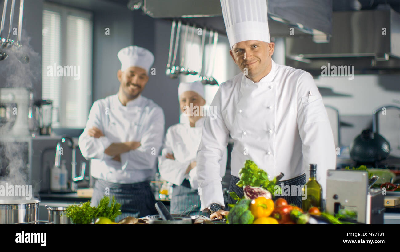 Chef prepares dishes in kitchen hi-res stock photography and images - Alamy