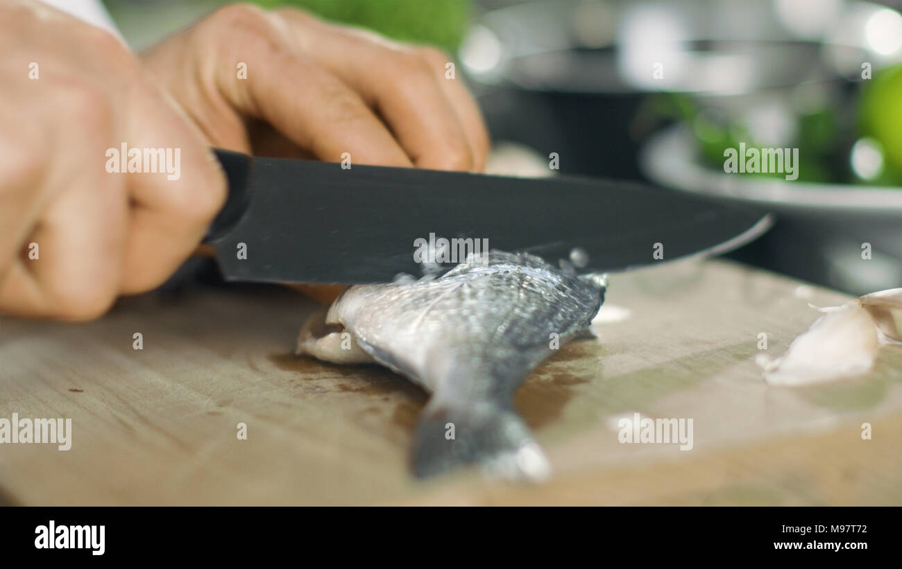 Cutting a big fish hi-res stock photography and images - Alamy
