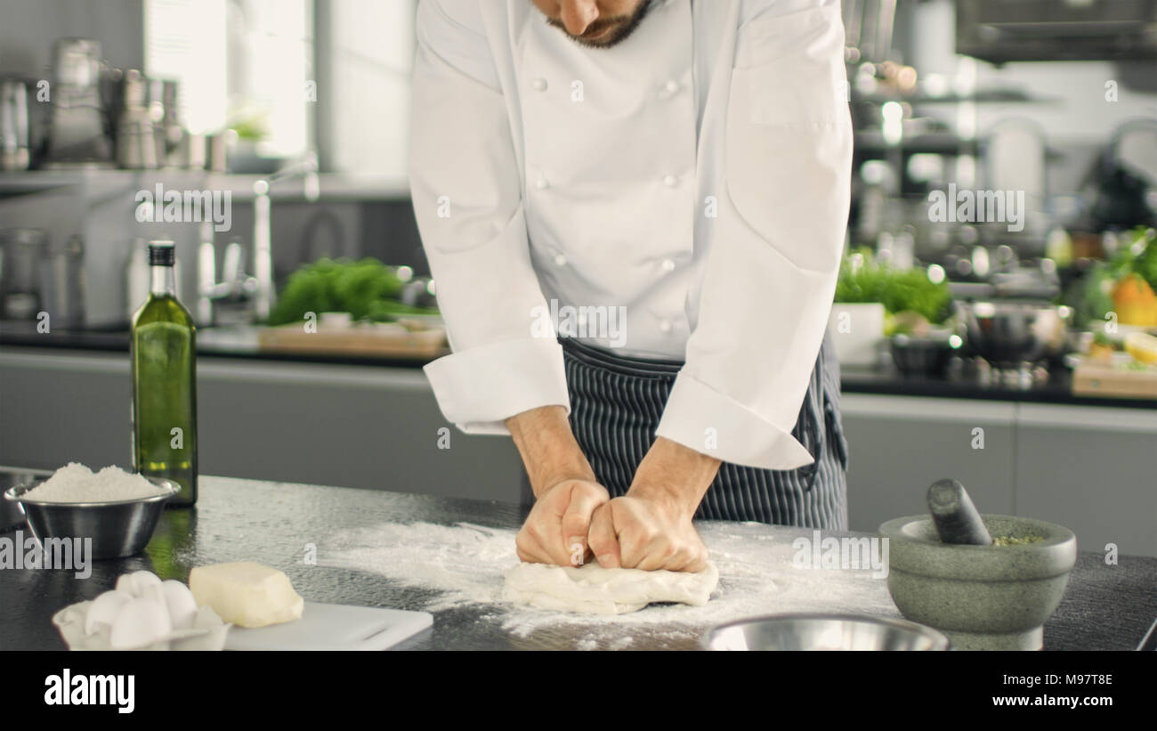 Baker Chef of Famous Restaurant Kneads the Dough in a Modern Looking ...