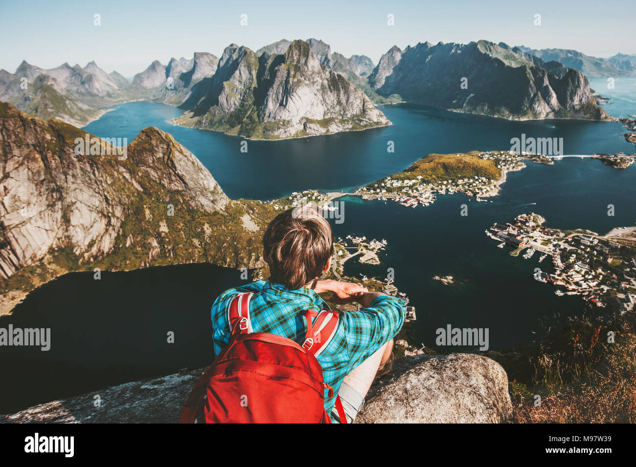 Man tourist relaxing on cliff edge alone enjoying aerial view exploring lifestyle travel ...