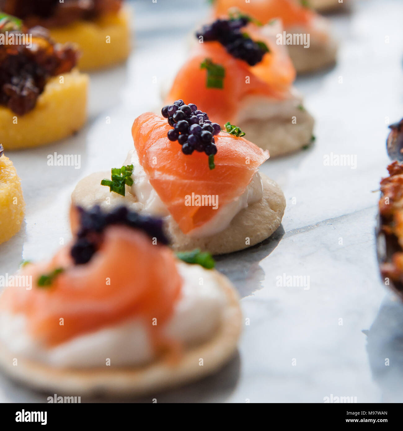 group of canapés on serving board Stock Photo - Alamy