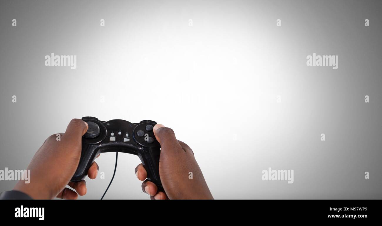 Hands holding gaming controller Stock Photo - Alamy