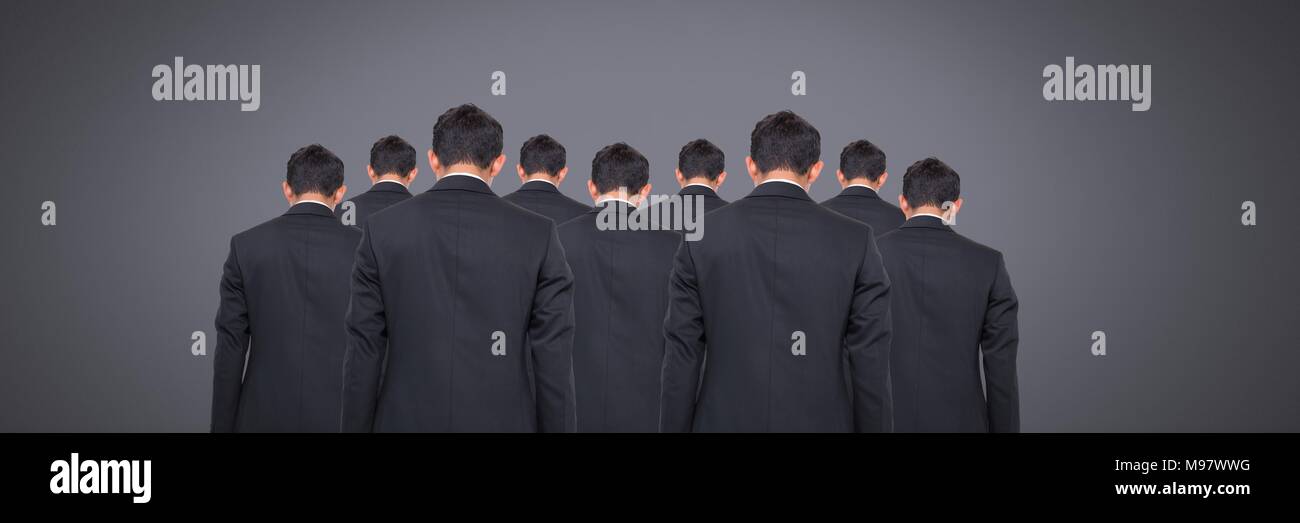 Clone men in group Stock Photo - Alamy