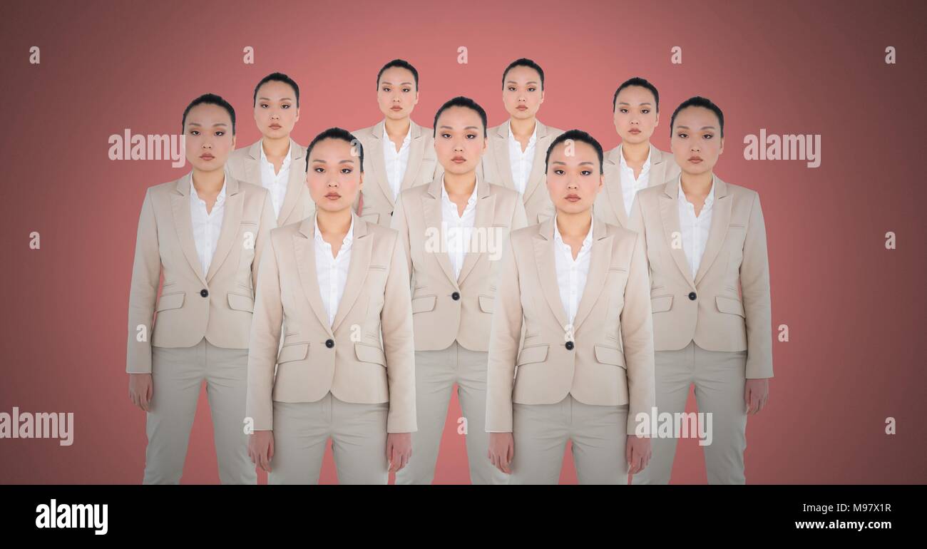 Clone women with pink background Stock Photo - Alamy