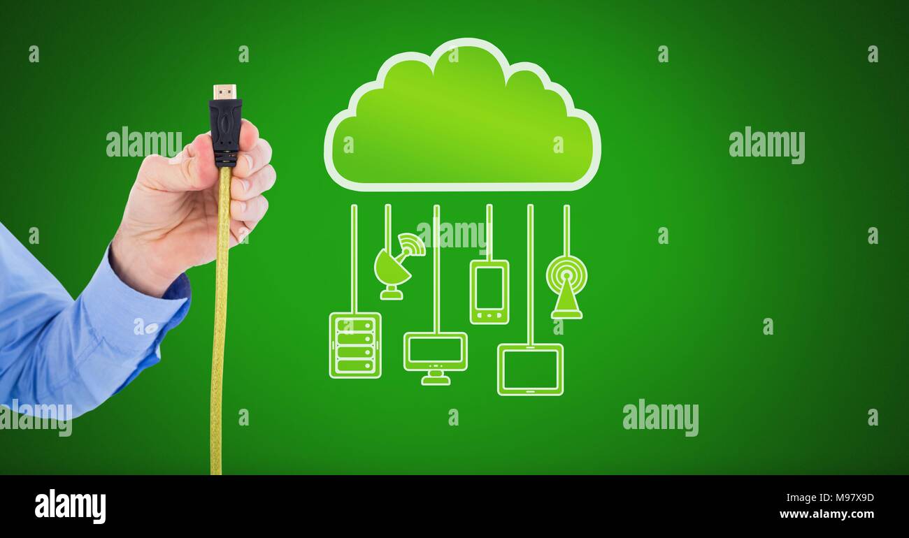 Hand holding wire connection with cloud devices Stock Photo - Alamy