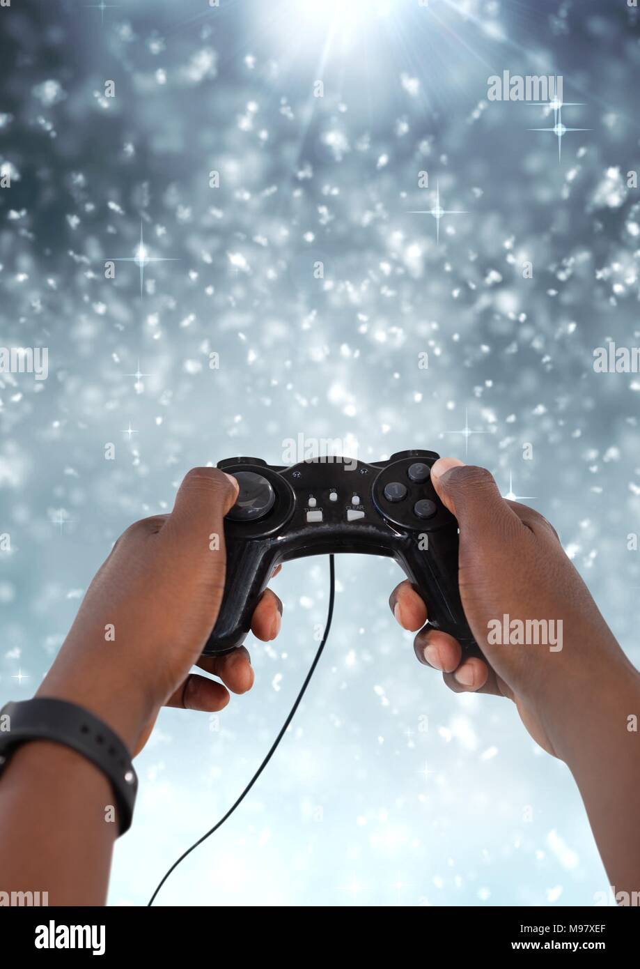 Hands holding gaming controller Stock Photo - Alamy