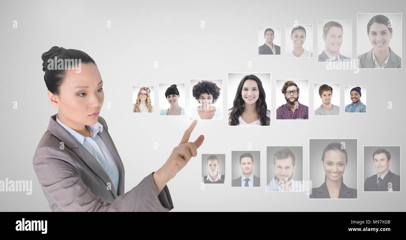 Woman touching portrait profiles of different people Stock Photo - Alamy