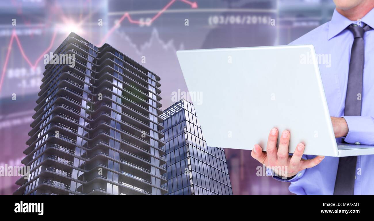 Businessman holding laptop and House with financial economic background ...