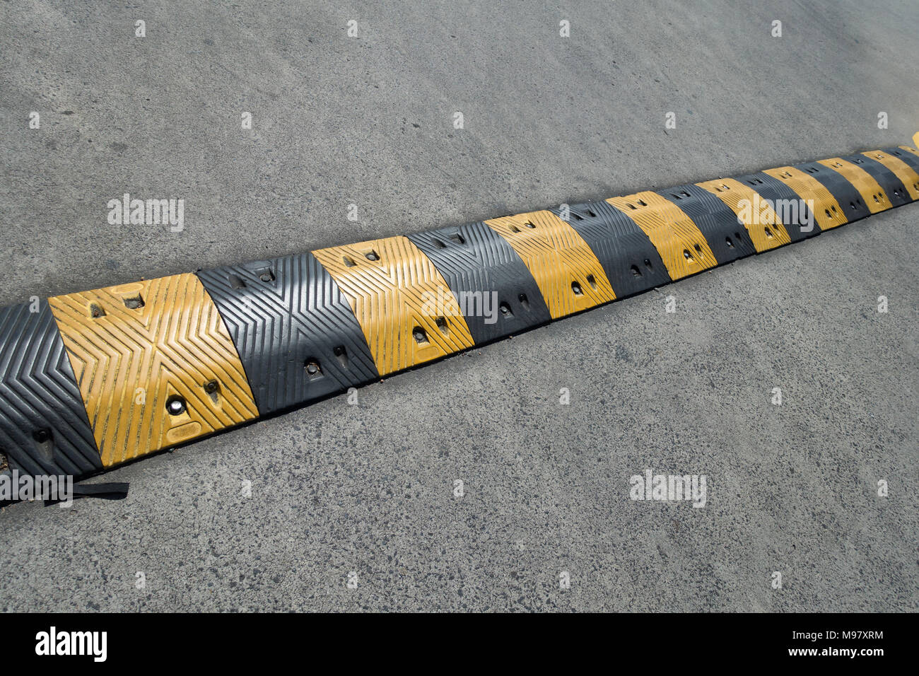 Speed hump hi-res stock photography and images - Alamy