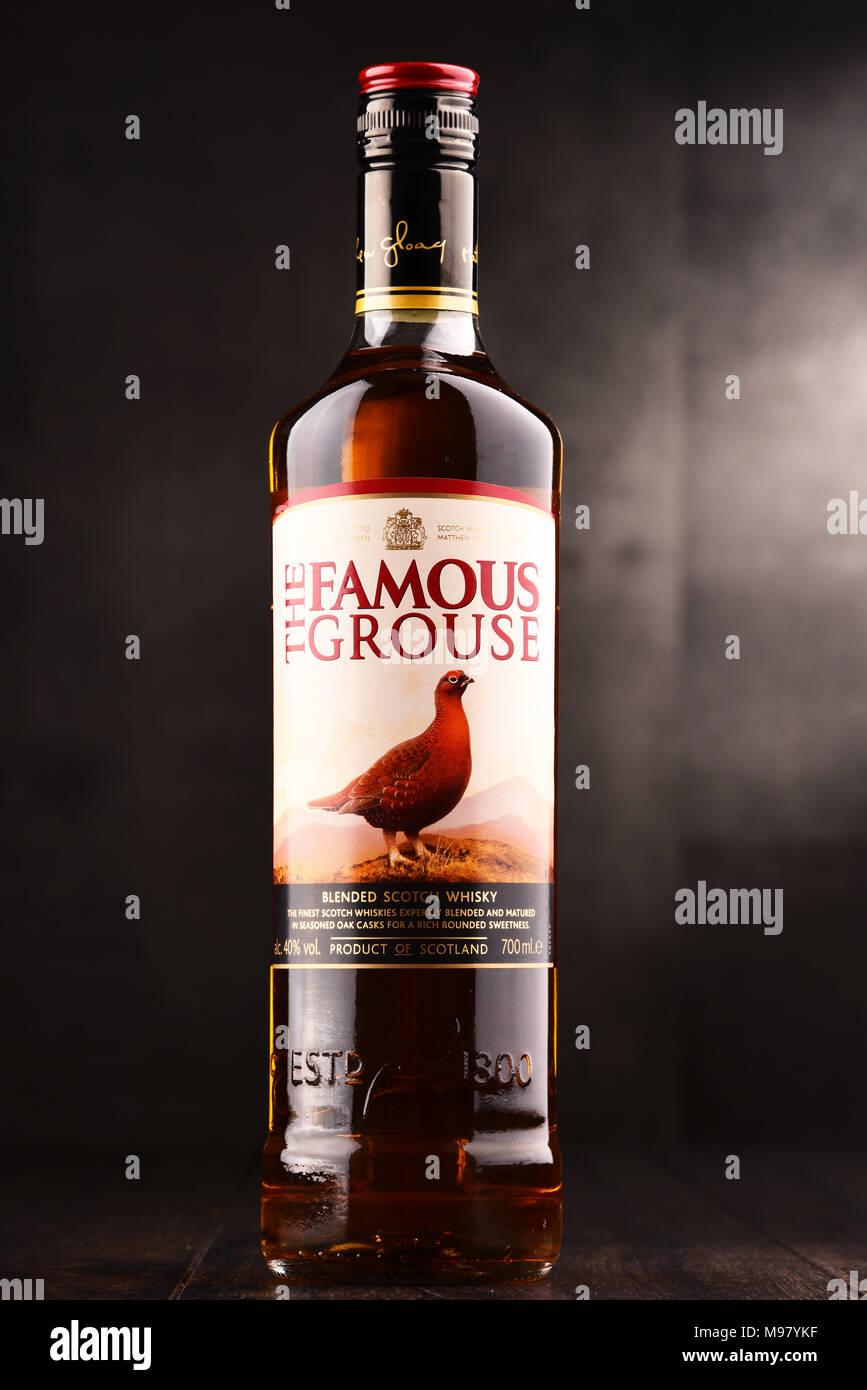 POZNAN, POLAND - MAR 9, 2018: Bottle of The Famous Grouse, a brand of ... POZNAN, POLAND - MAR 9, 2018: Bottle of The Famous Grouse, a brand of ...