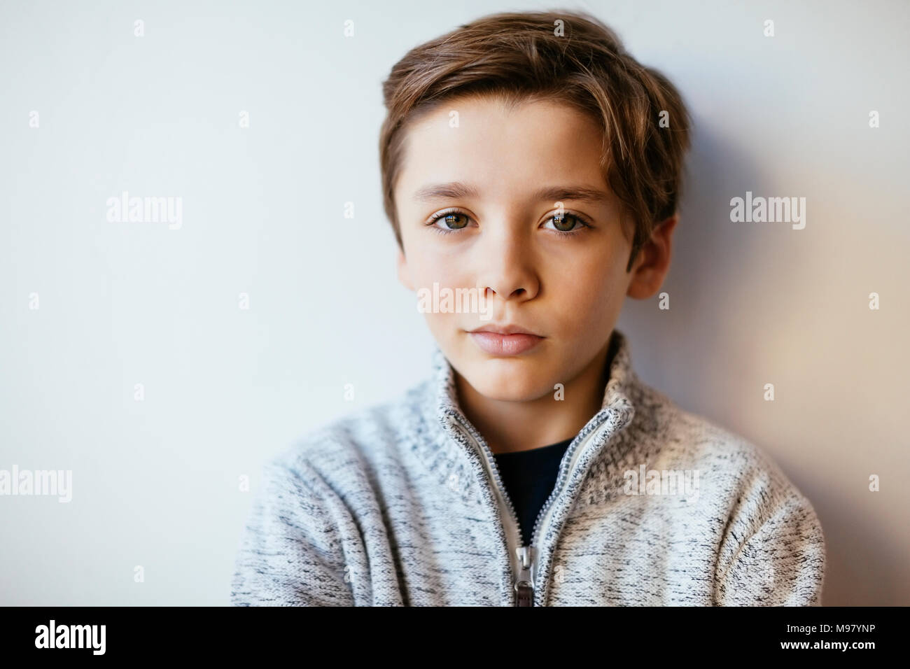 Portrait of confident brunette boy Stock Photo - Alamy