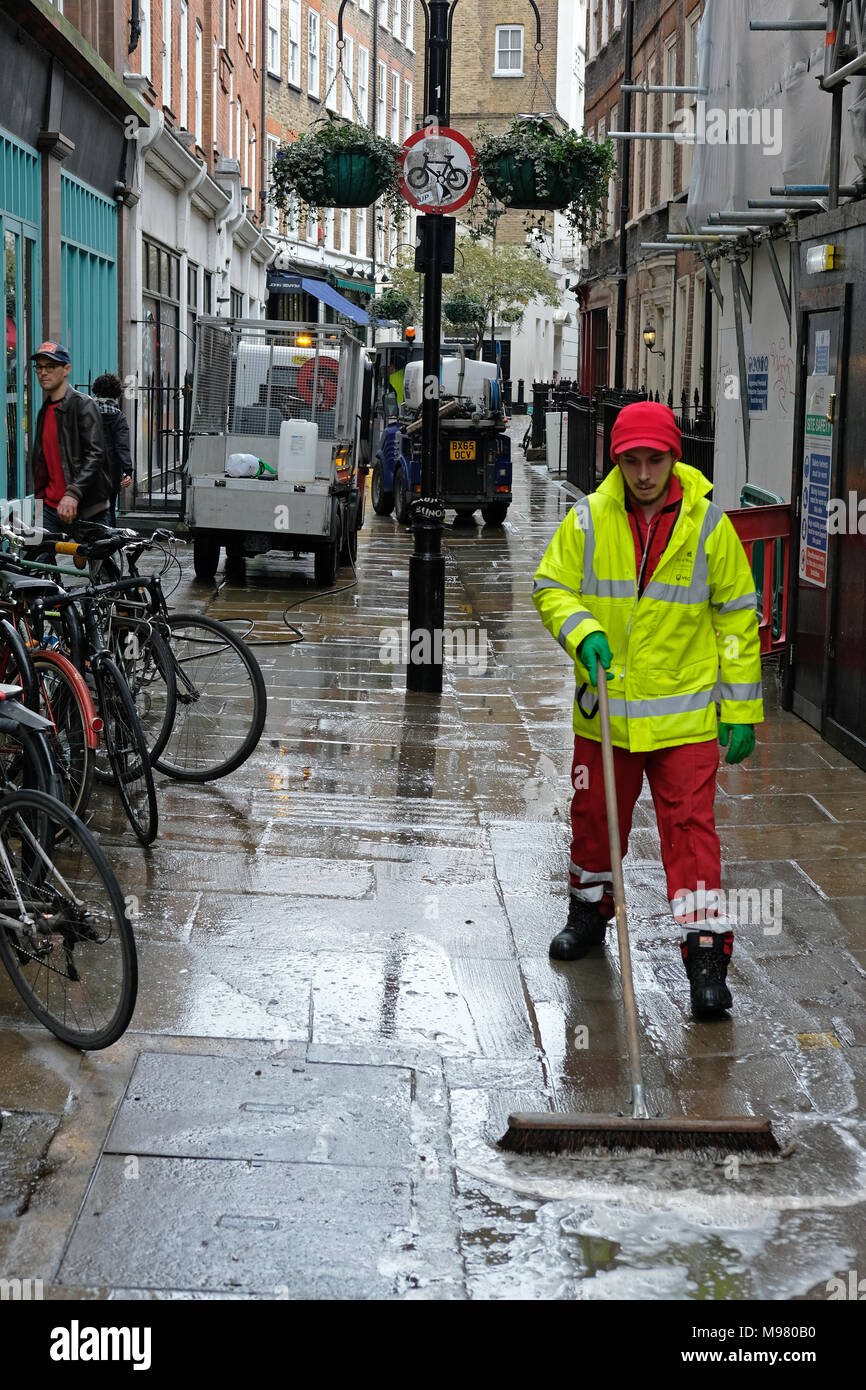 Street cleaning in Soho, London Stock Photo - Alamy