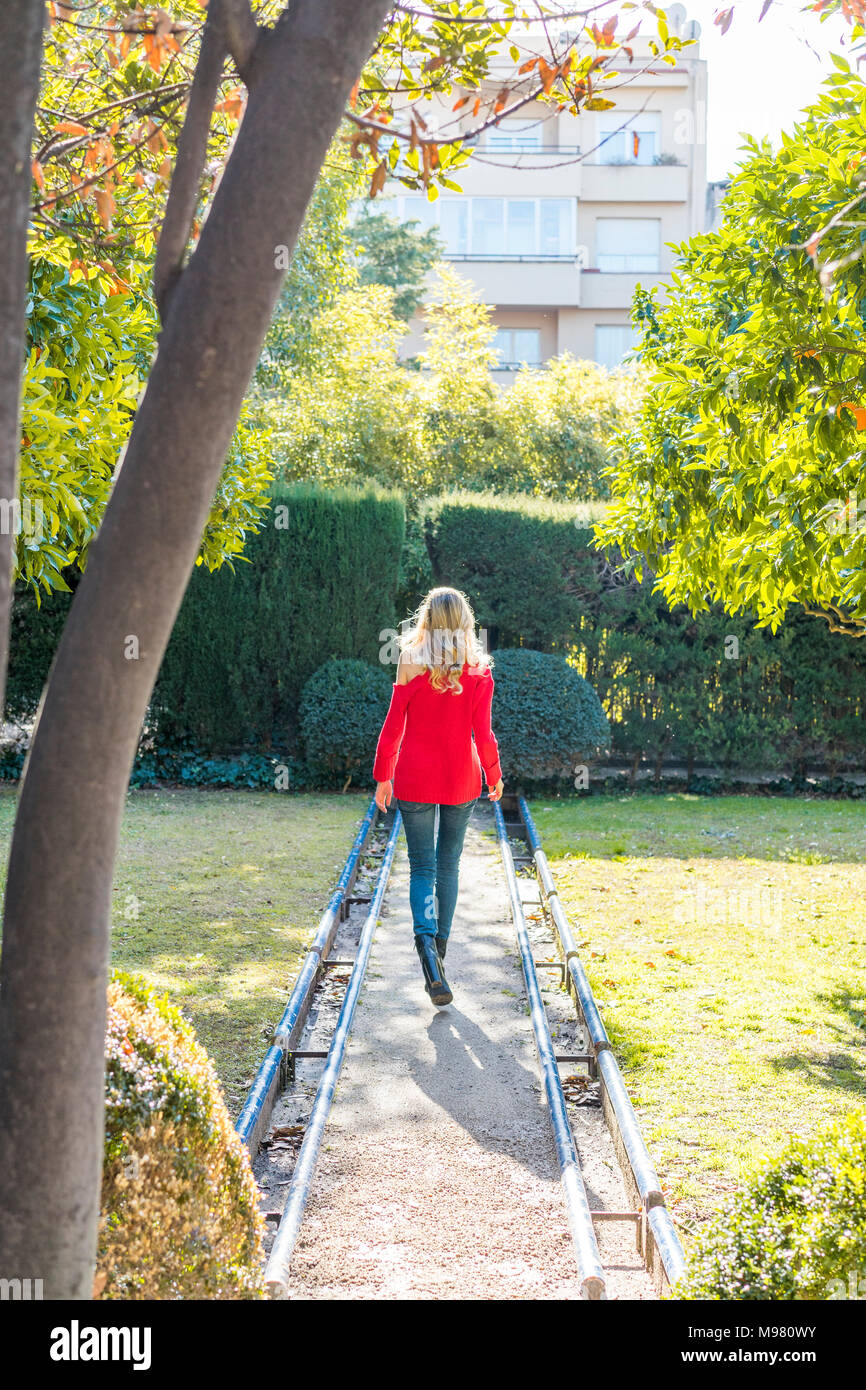 Woman walking on path hi-res stock photography and images - Alamy