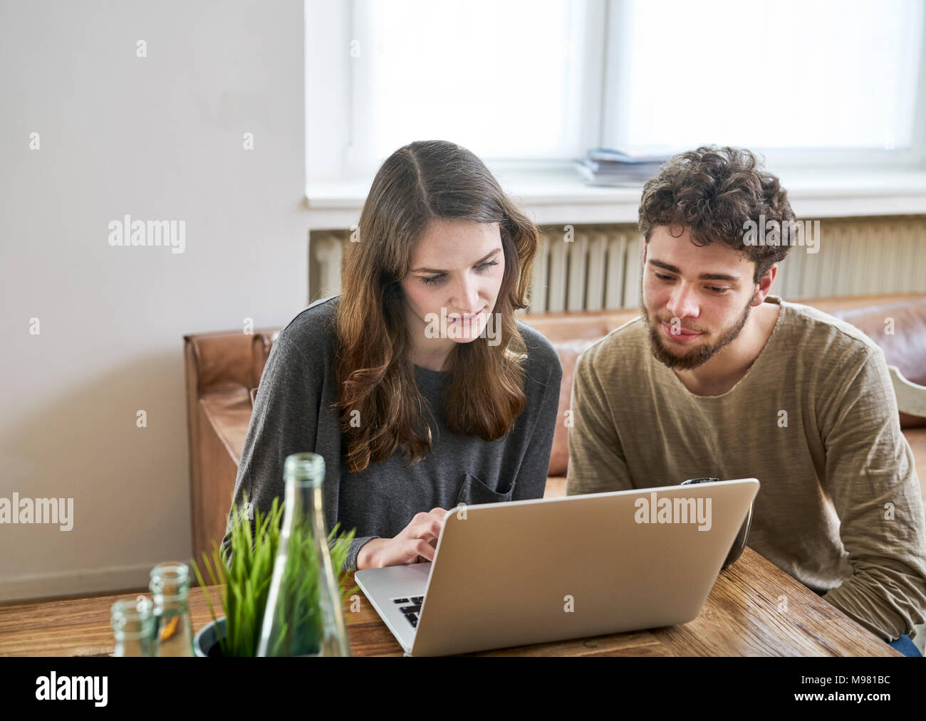 Creative colleagues working on hi-res stock photography and images - Alamy