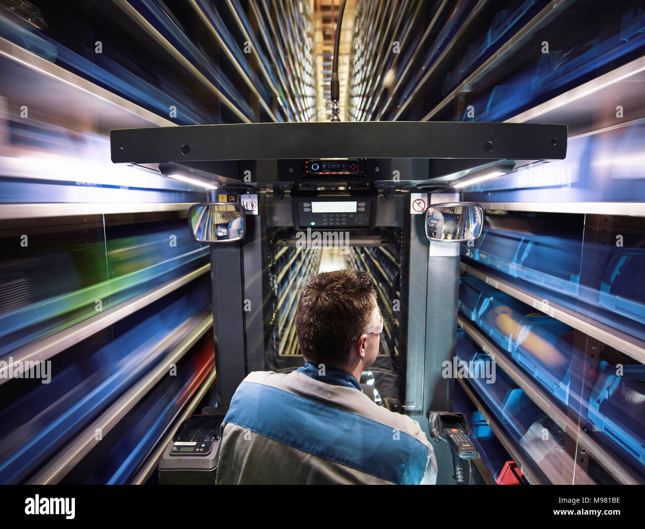 Worker operating hi-res stock photography and images - Alamy