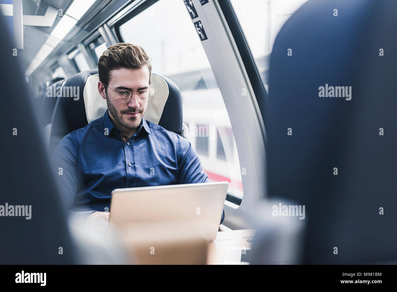 Commuter train people working hi-res stock photography and images - Alamy