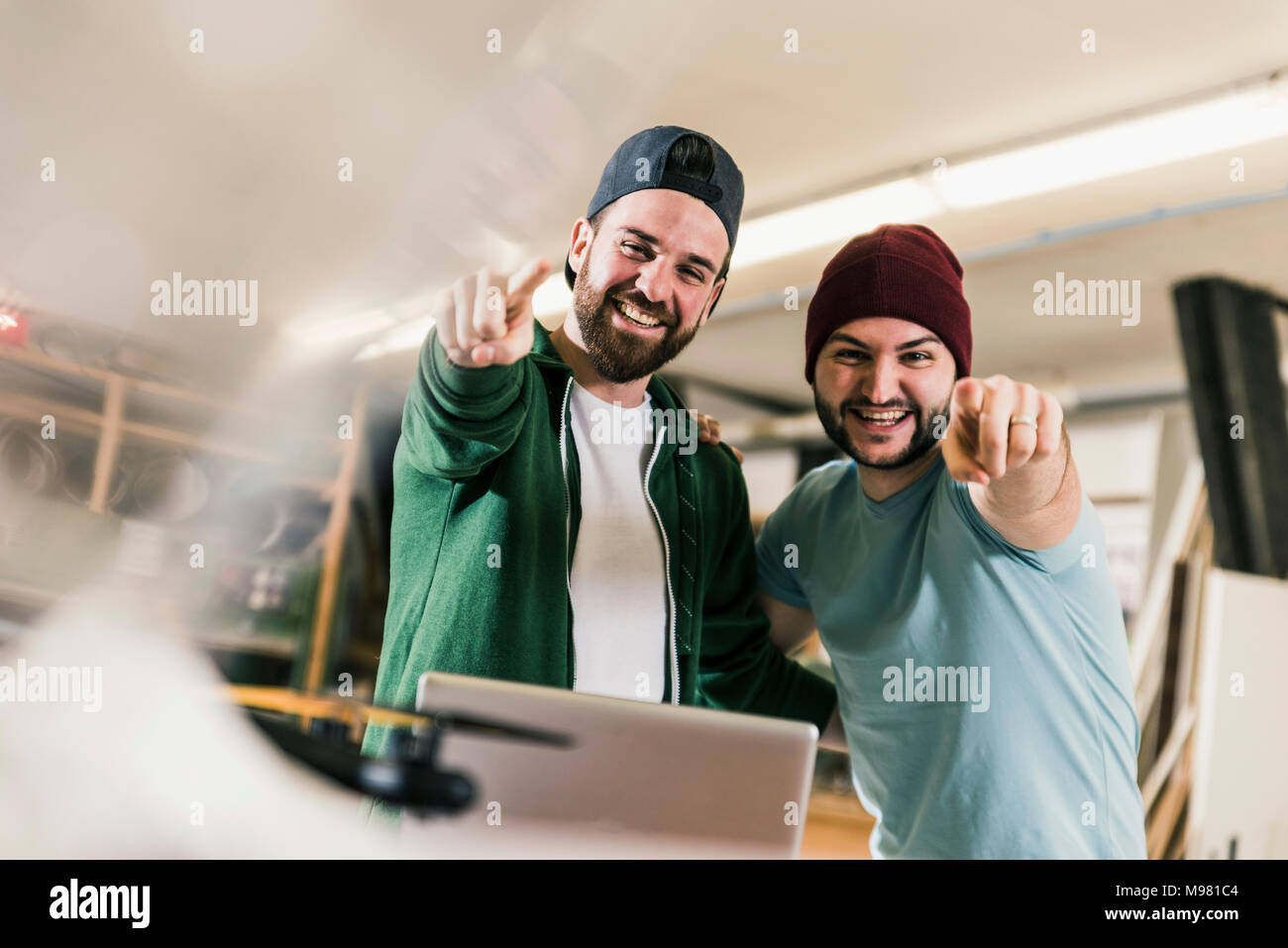 Two happy men colleagues hi-res stock photography and images - Alamy
