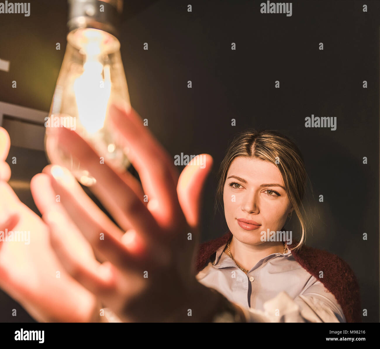 Hand reaching out touching hi-res stock photography and images - Alamy