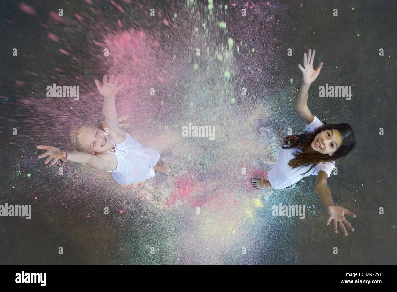 Throwing color powder hi-res stock photography and images - Alamy