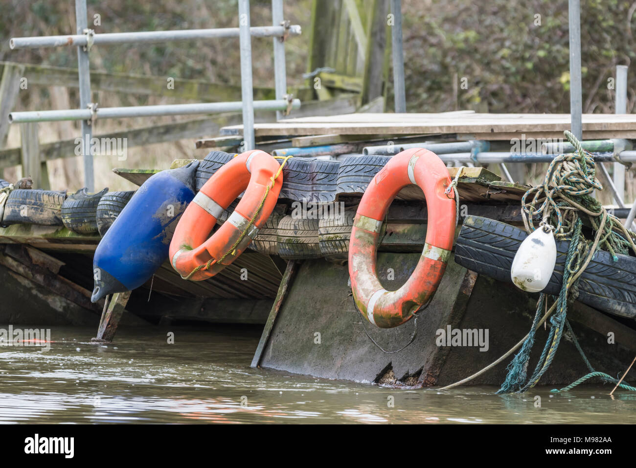 Boat mooring point on a river Stock Photo - Alamy