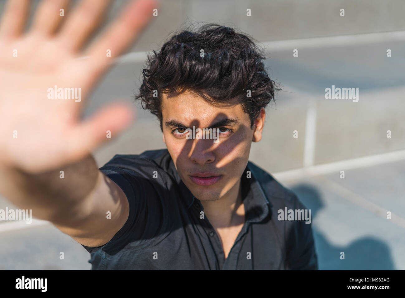 Man shielding eyes looking at view hi-res stock photography and images ...