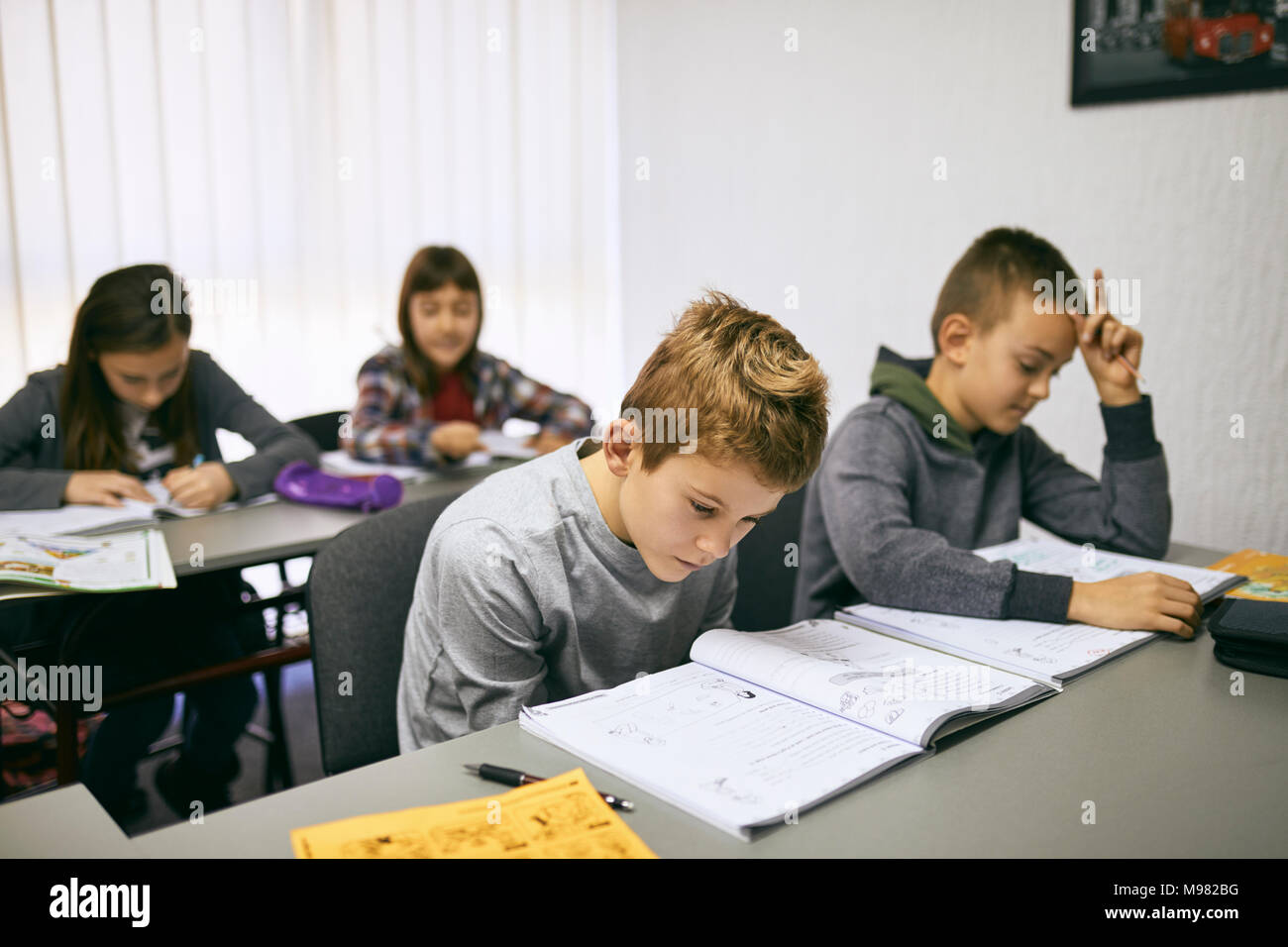Students learning in class Stock Photo - Alamy