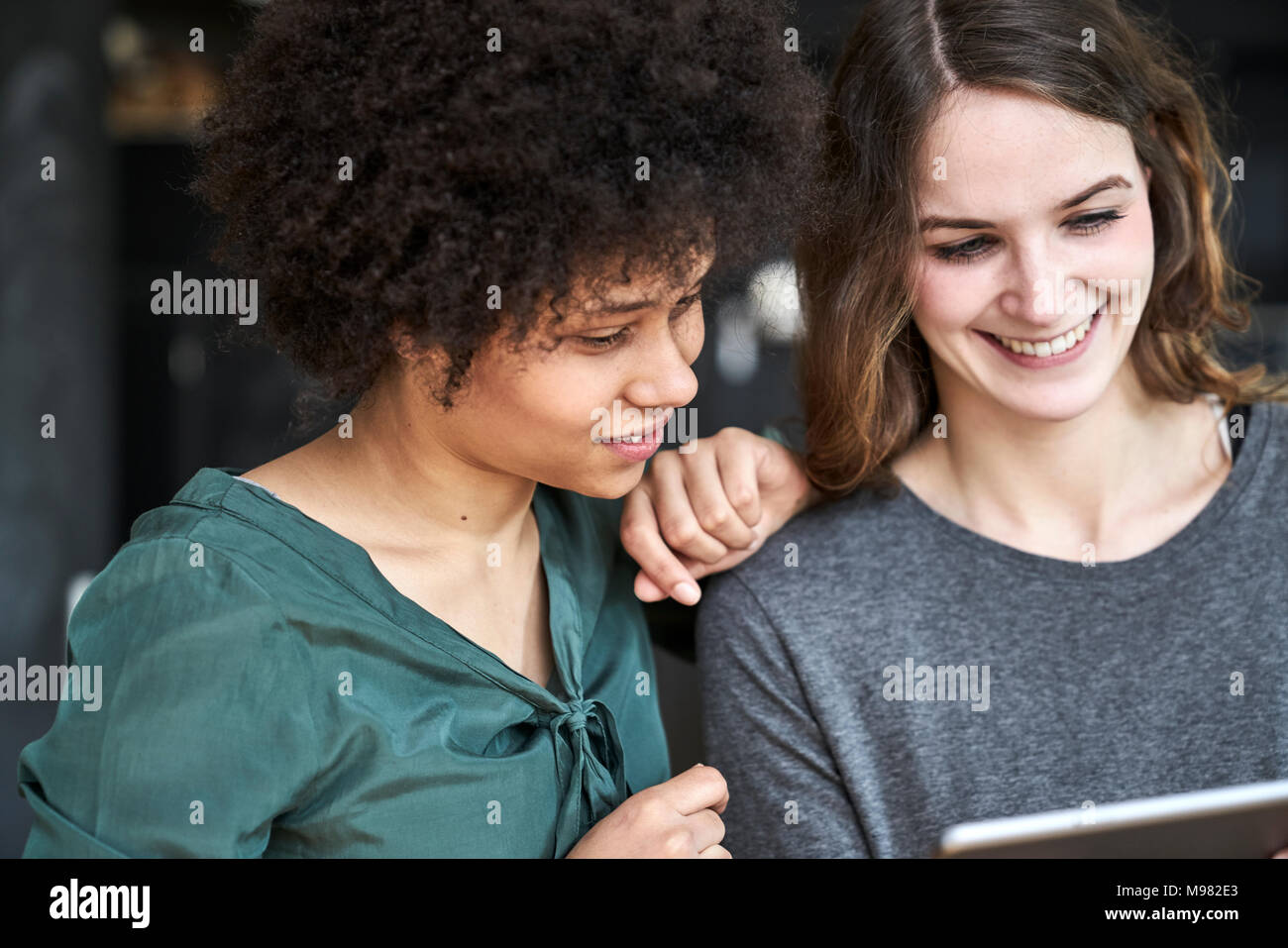 Sharing two people hi-res stock photography and images - Alamy