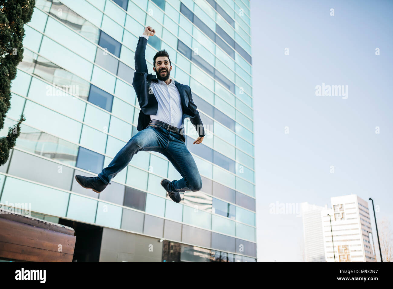 Happy high jump businessman hi-res stock photography and images - Alamy