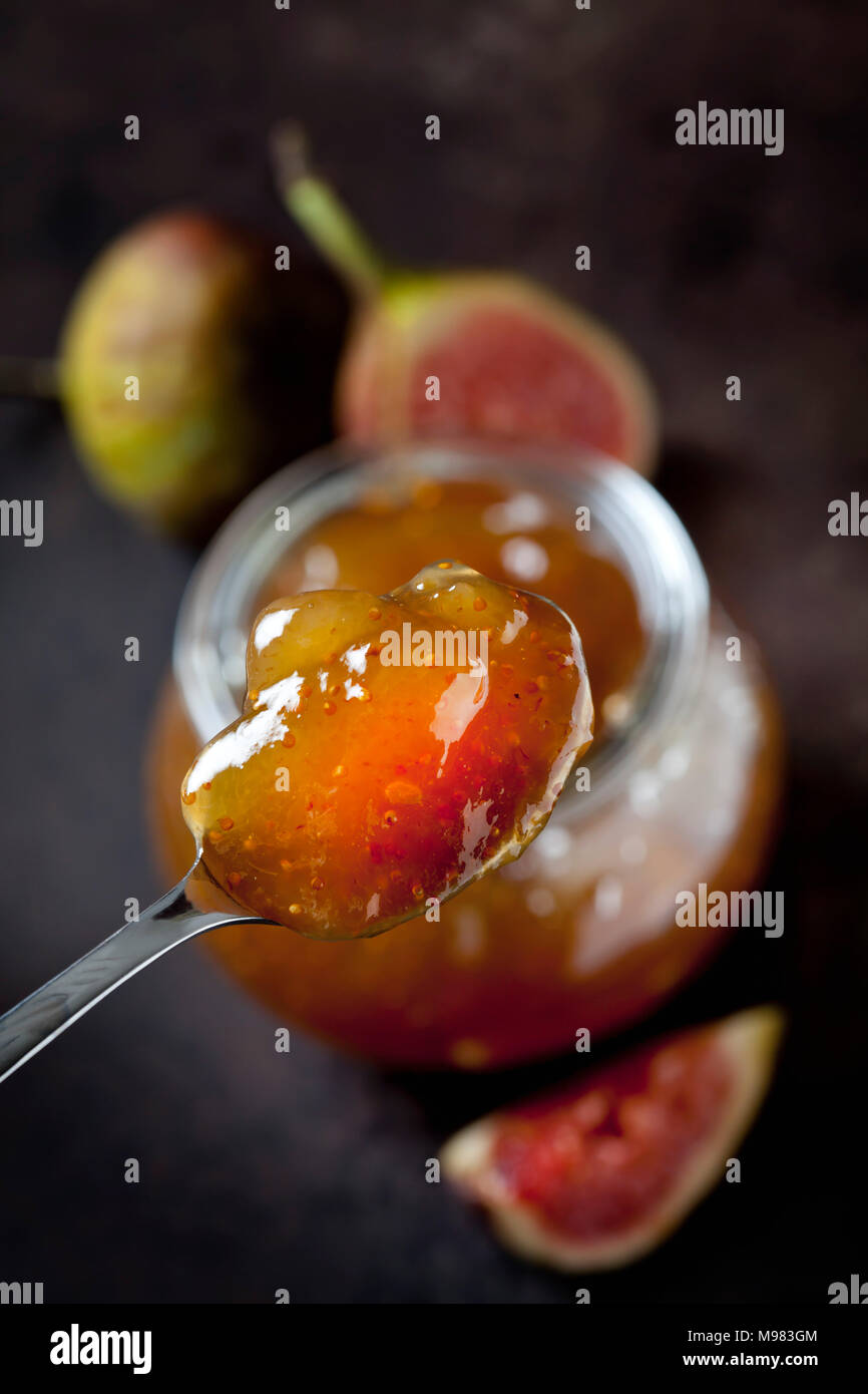 Spoon of fig jam, close-up Stock Photo - Alamy