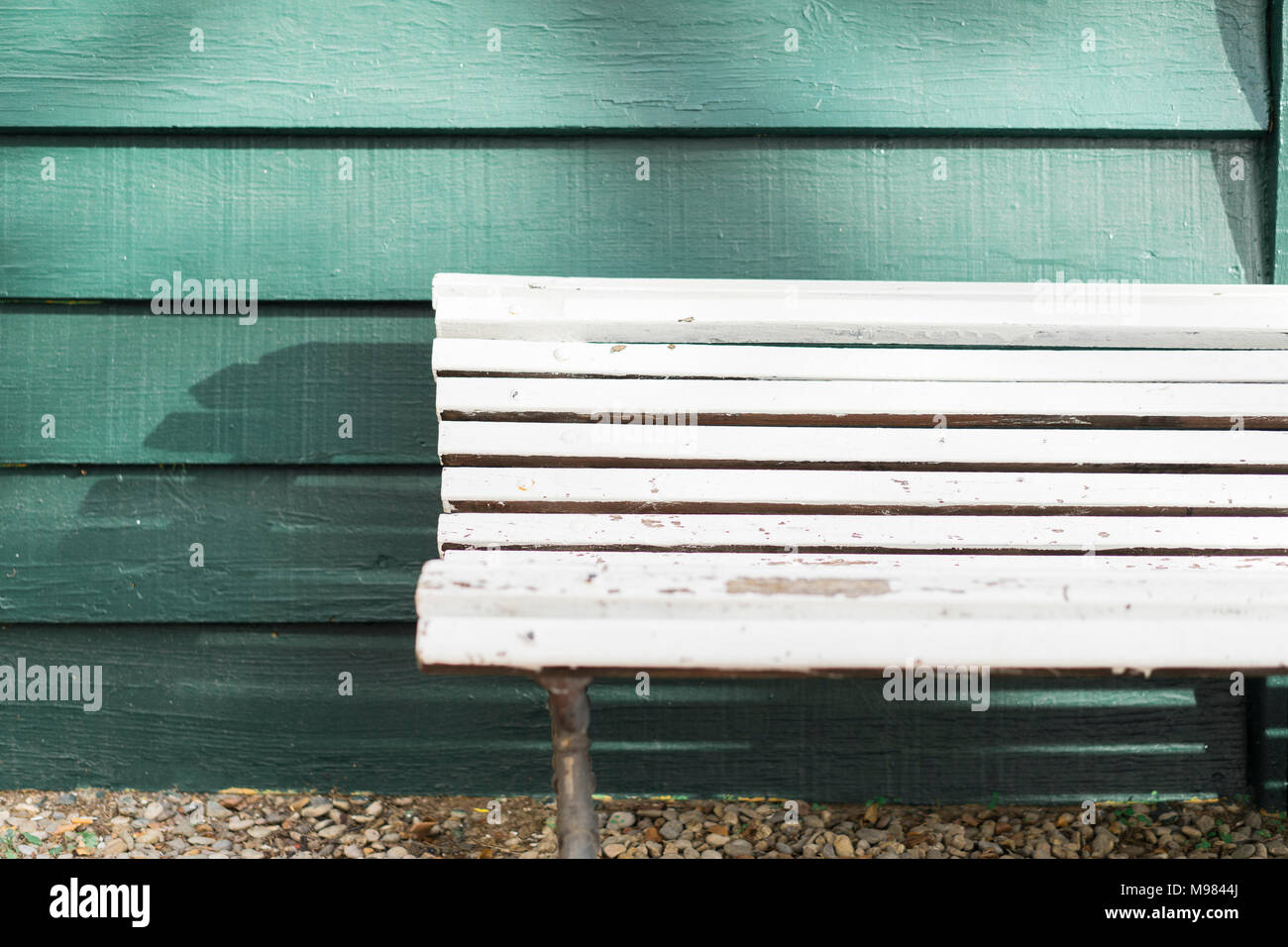Empty white wooden bench Stock Photo - Alamy