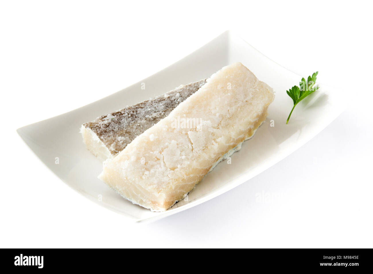 Salted dried cod isolated on white background. Typical Easter food ...