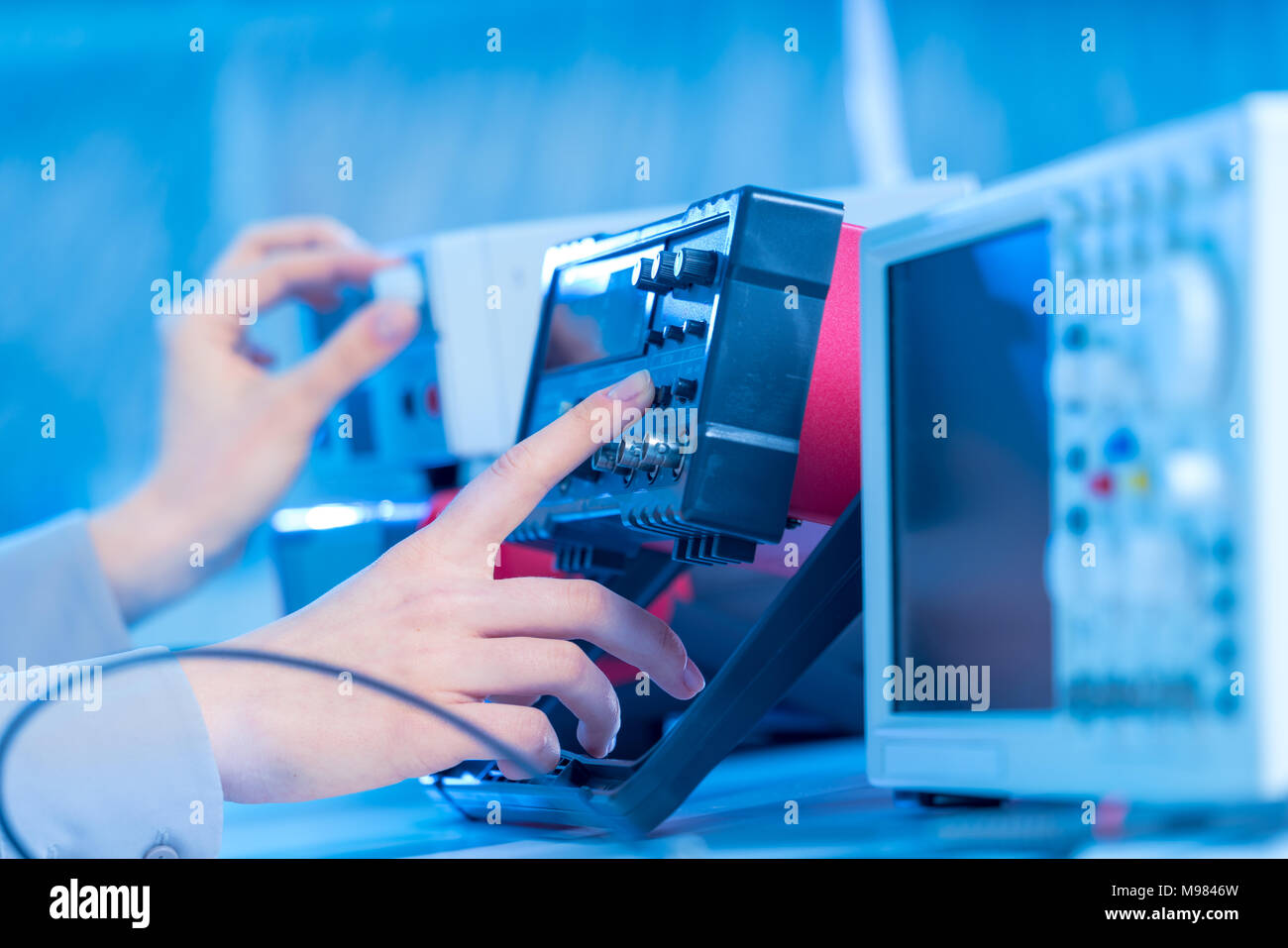 The use of measurement in the electronics laboratory Stock Photo - Alamy