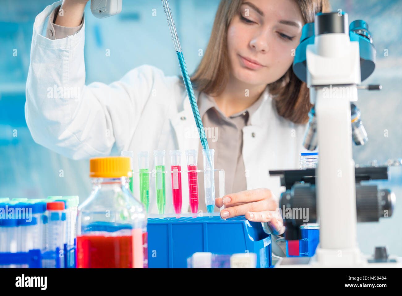 Chemical laboratory scientist woman working with pipette Stock Photo ...