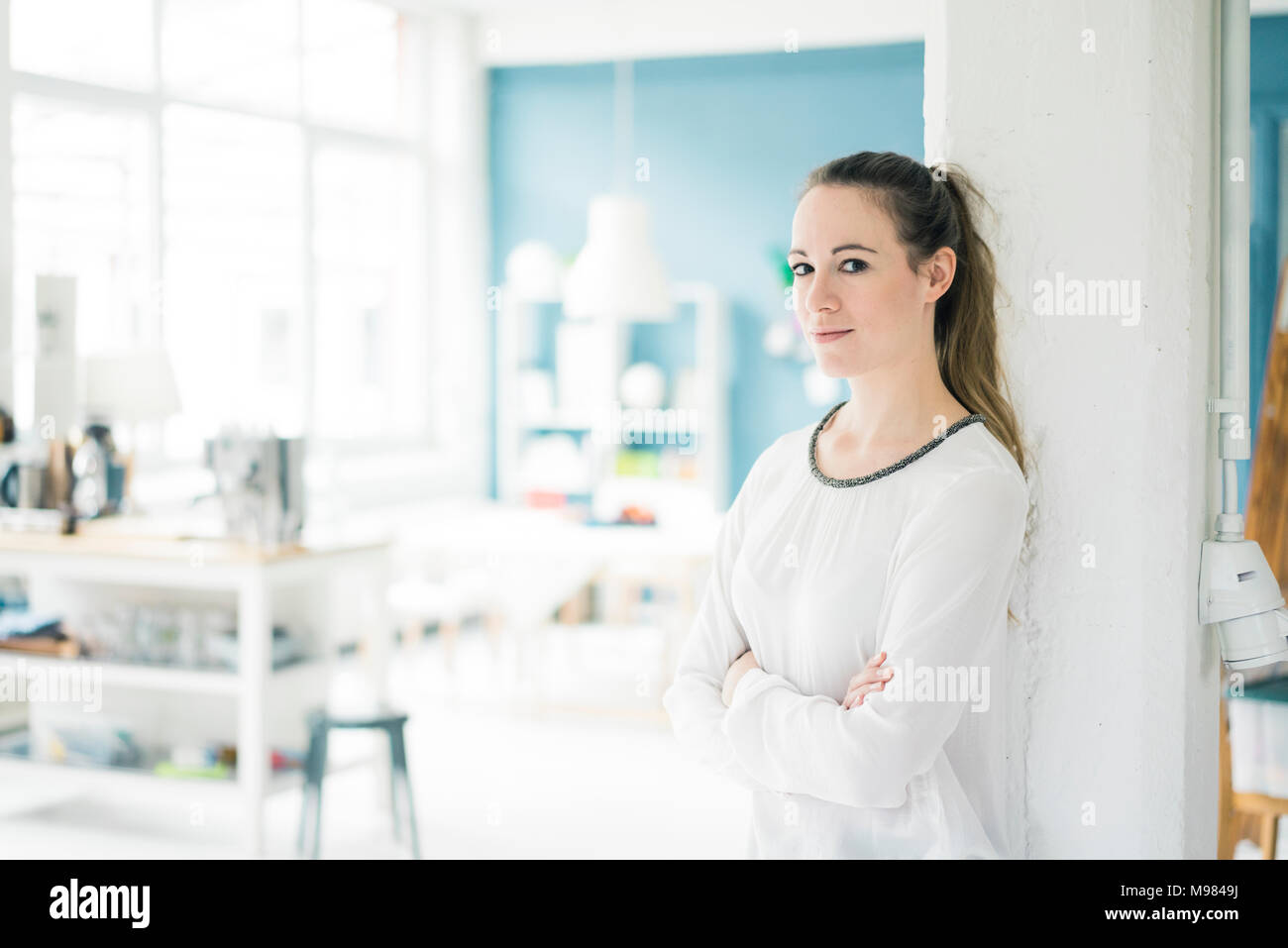 Modern loft woman standing home hi-res stock photography and images - Alamy