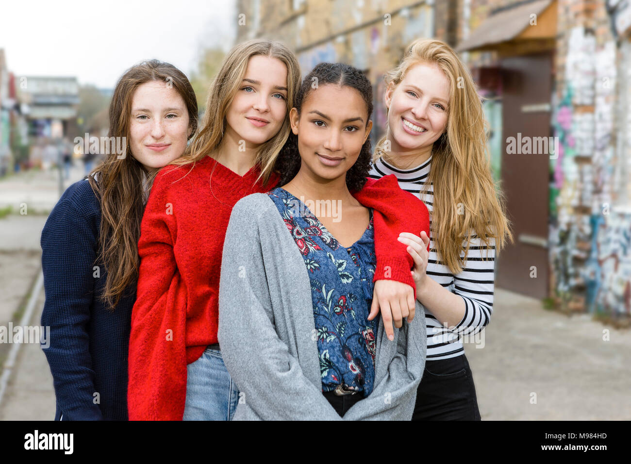 Germany, Berlin, group picture of four girlfriends Stock Photo - Alamy