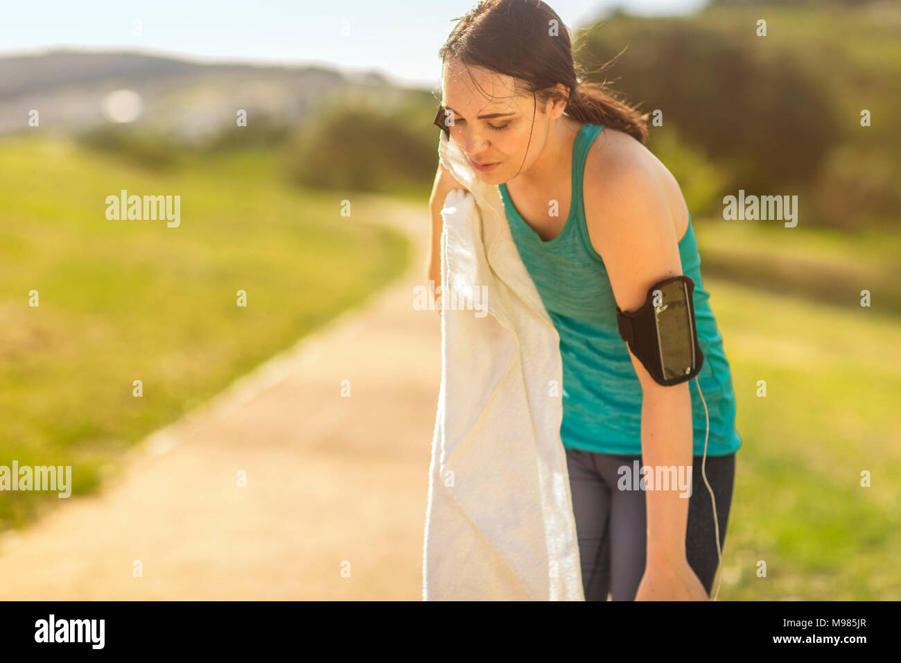 Exhausted female athlete hi-res stock photography and images - Alamy