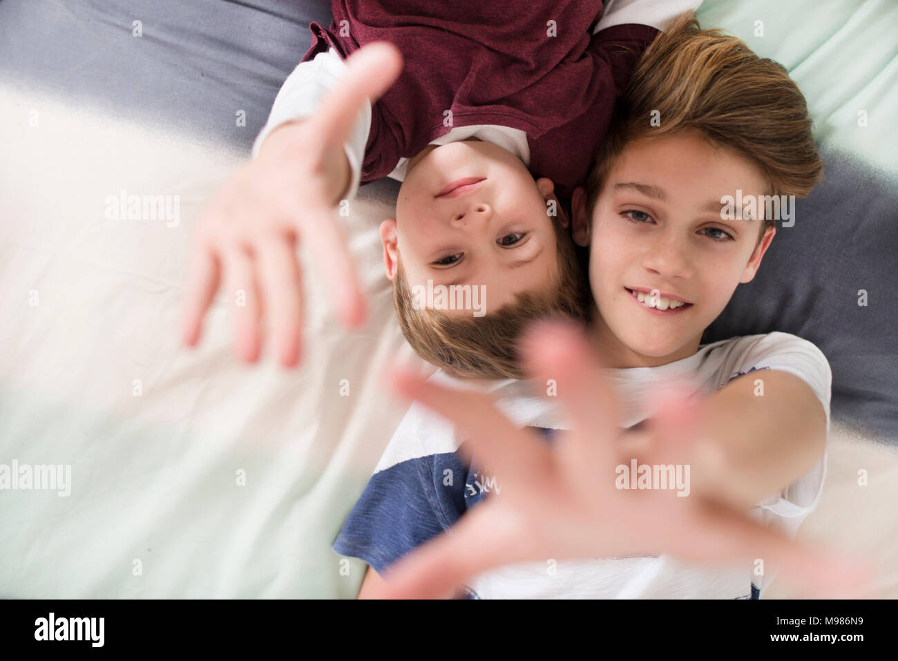 Two hands reaching out hi-res stock photography and images - Alamy
