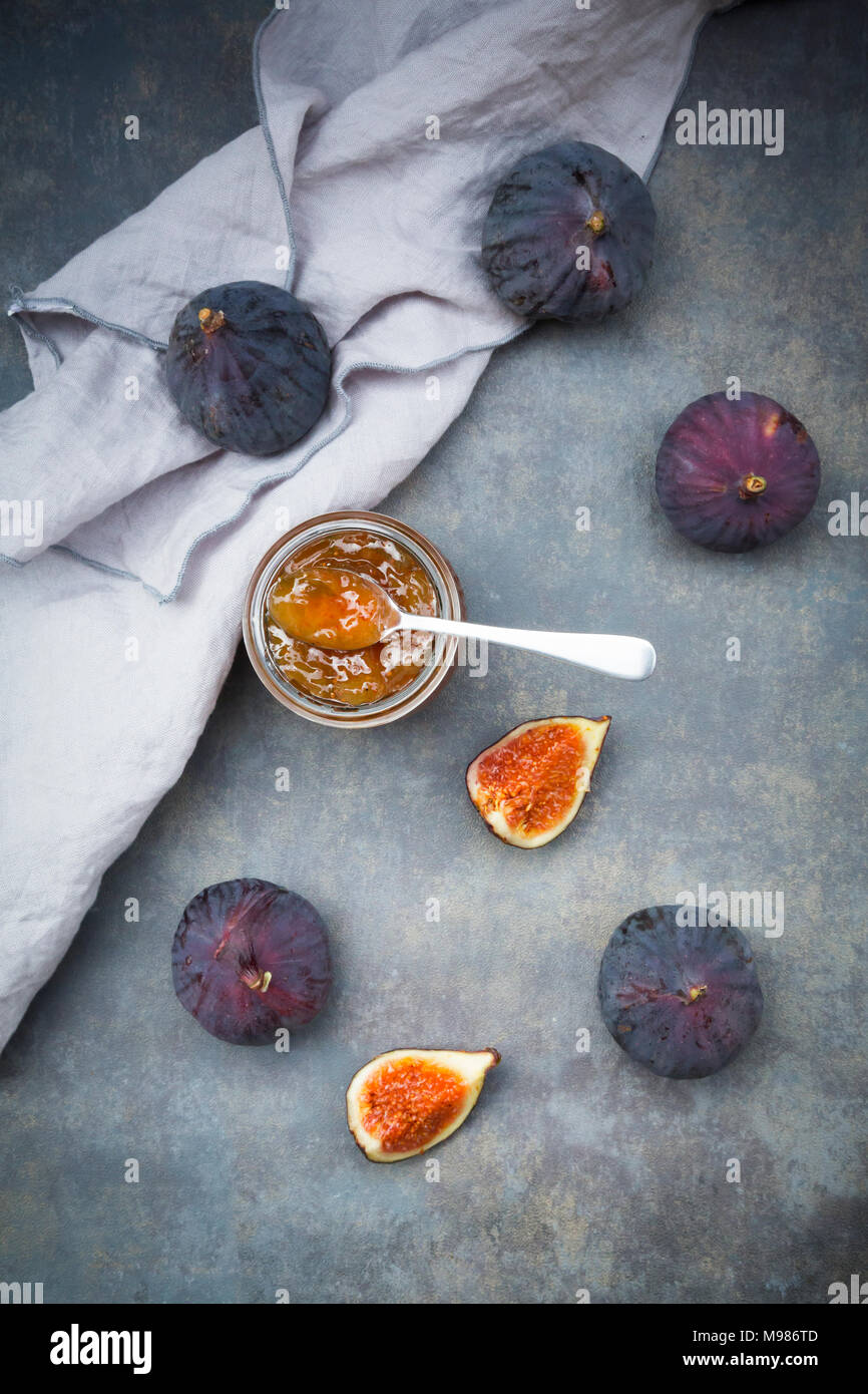 Organic figs and a glass of fig jam Stock Photo - Alamy