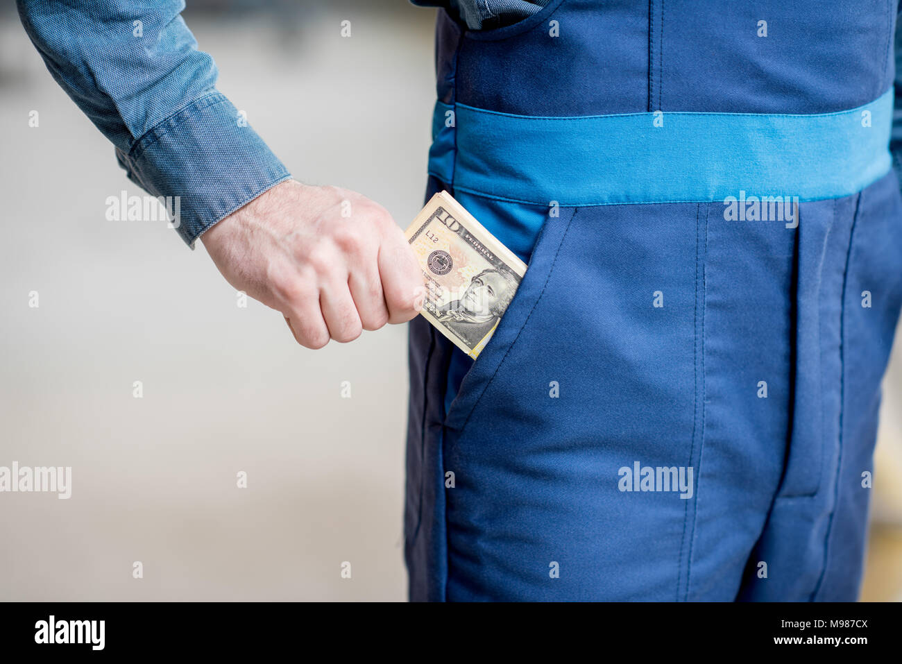 Money construction contractor hi-res stock photography and images - Alamy