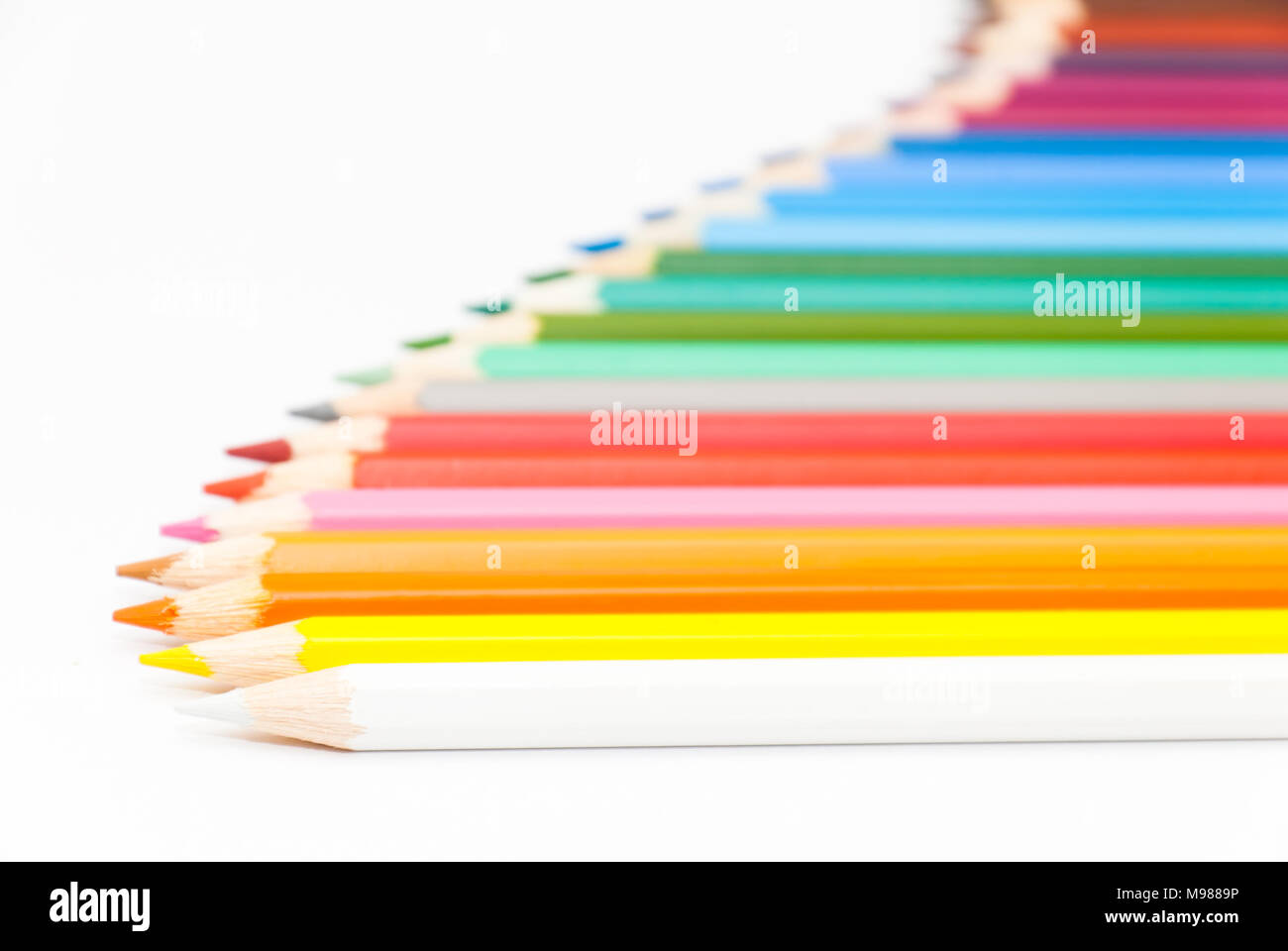 Number of colored pencils on white background Stock Photo - Alamy