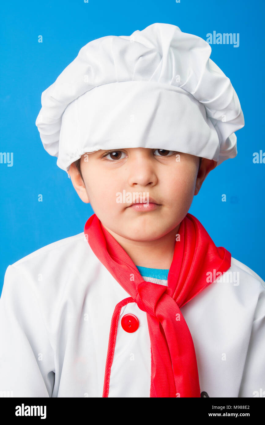 The little boy in a suit of the cook. adorable little boy in chef hat ...