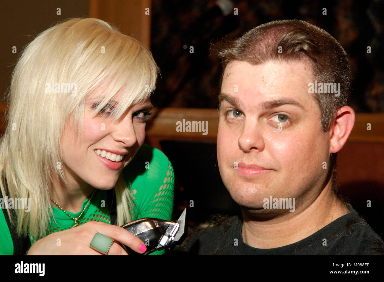 (L-R) Singer Lucy Walsh with hair clippers after cutting Cable Guy Jeff ...