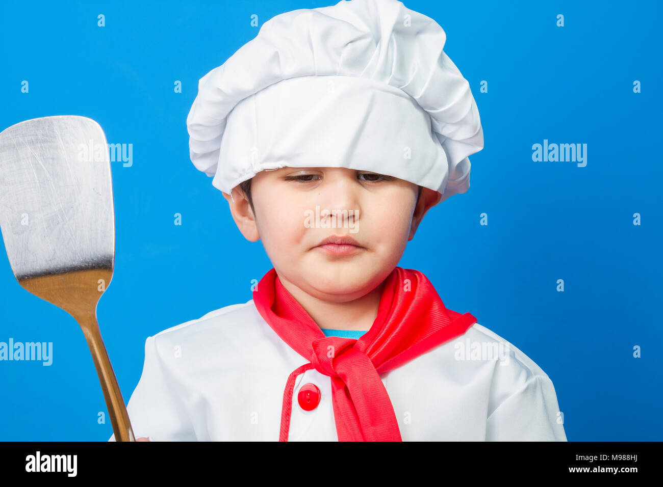 The little boy in a suit of the cook. adorable little boy in chef hat ...