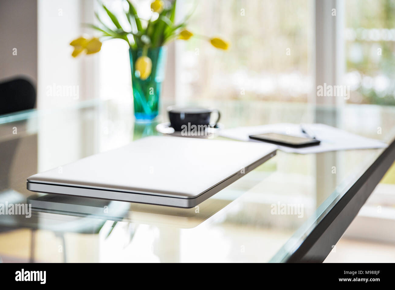 On glass table hi-res stock photography and images - Alamy