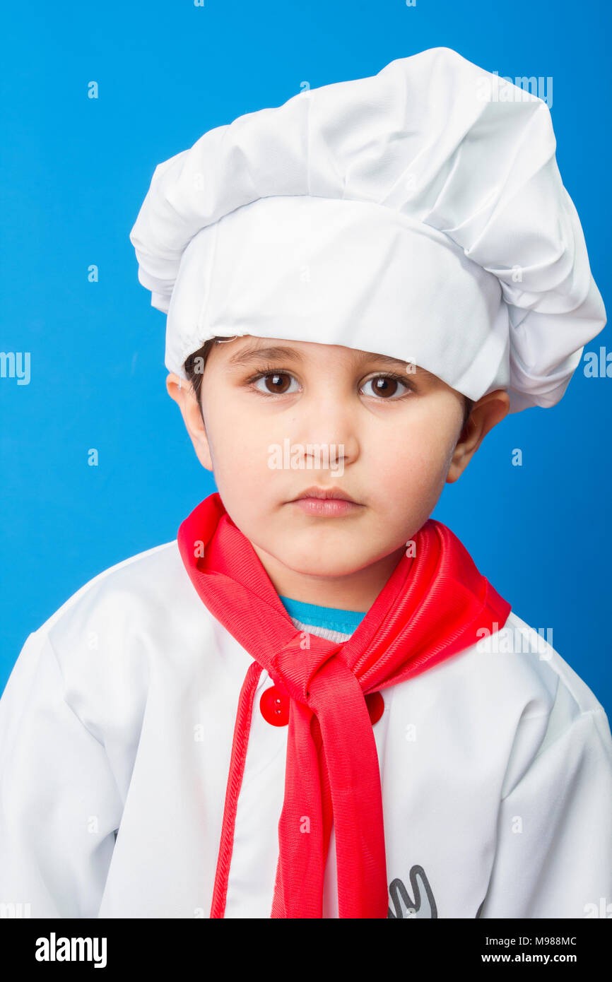 The little boy in a suit of the cook. adorable little boy in chef hat ...