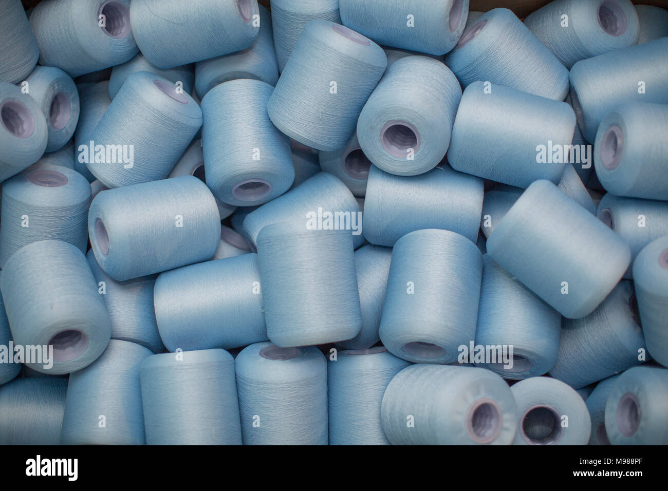 Blue cotton reels Stock Photo - Alamy