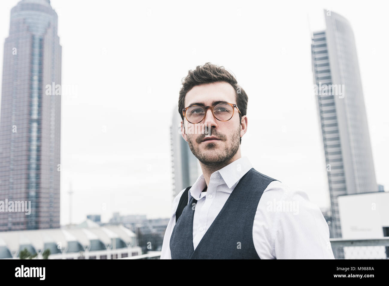 Portrait young businessman in glasses hi-res stock photography and ...